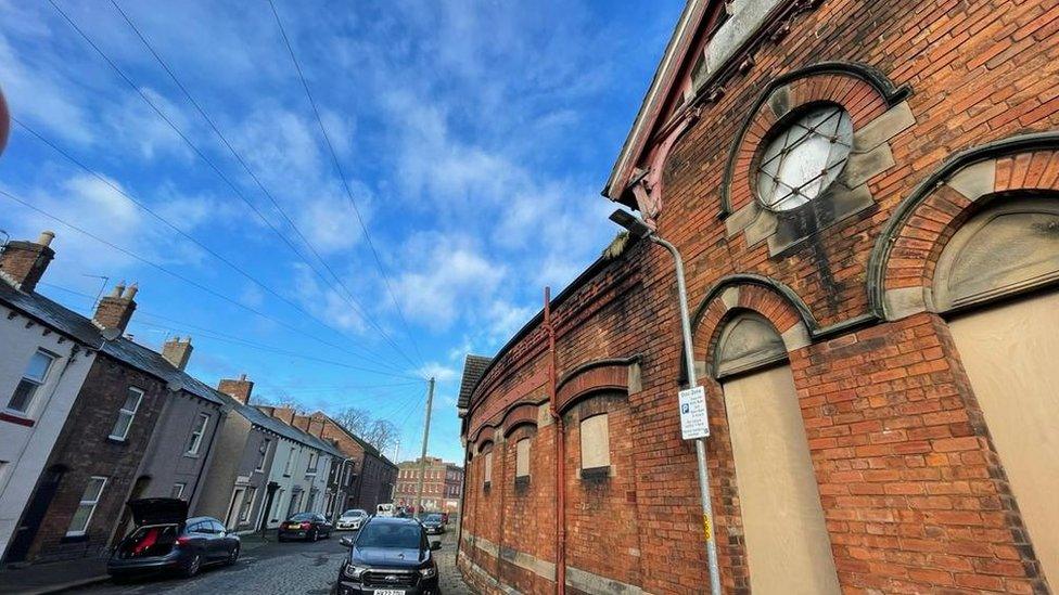 Carlisle: Star of David window at Carr's factory to be restored - BBC News