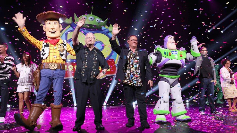 Toy Story 4 to be a love story and Toy Story land is coming - BBC News