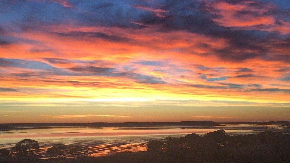 In pictures: Spectacular sunrise over Scotland - BBC News