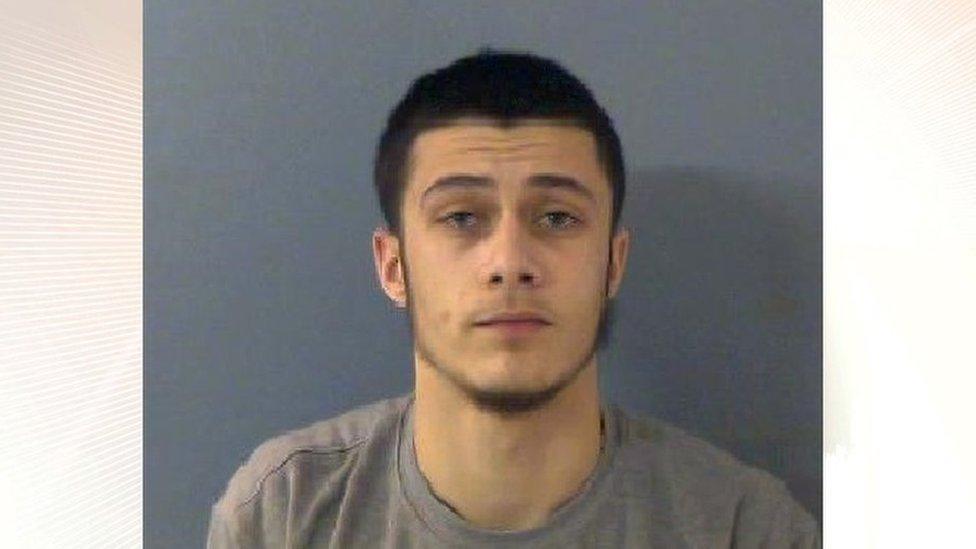 Man who drove at police in Aylesbury has sentence cut - BBC News