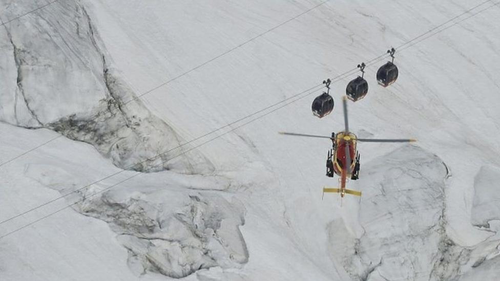 German cable car collision leaves dozens stranded in mid-air - BBC News