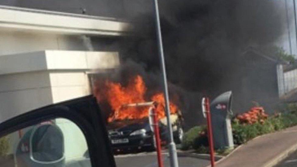 Greater Manchester KFC set on fire by burning car - BBC News
