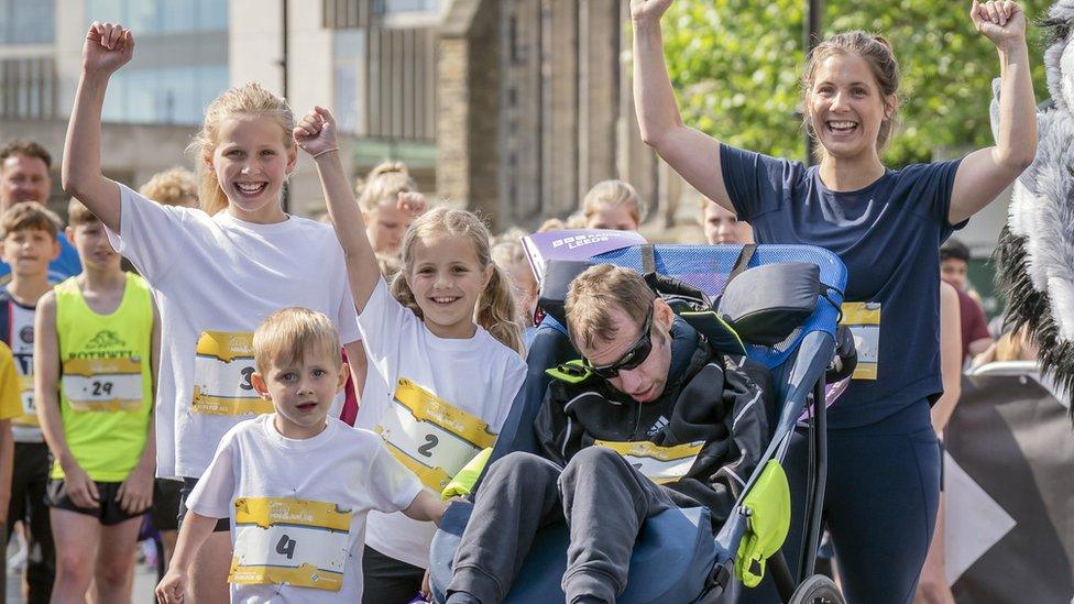 Rob Burrow's children join him at Father's Day run - BBC News