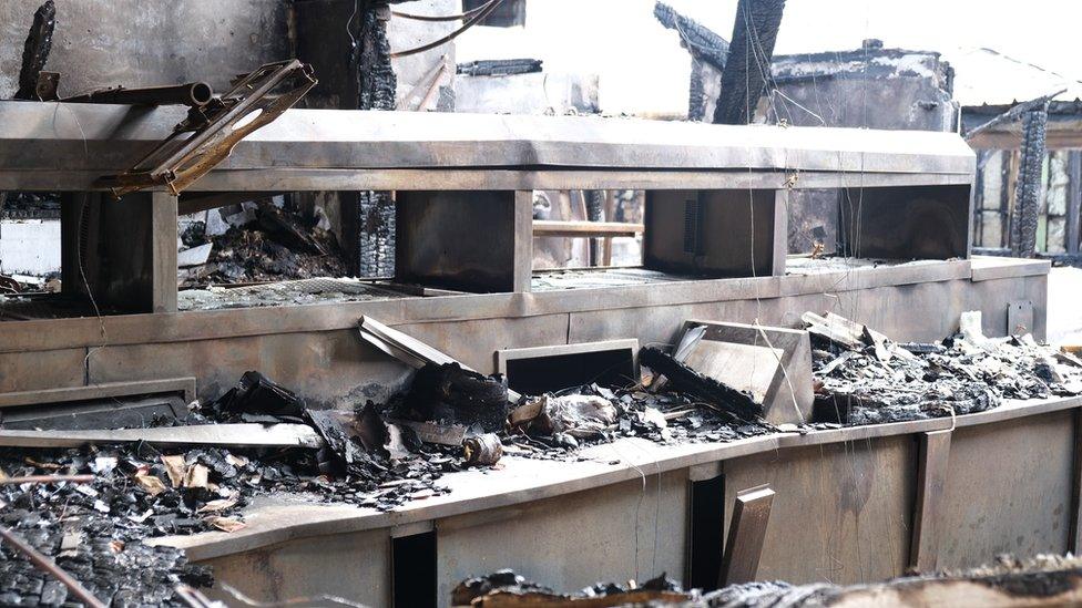 Looe fish and chip restaurant reopens after catastrophic fire - BBC News
