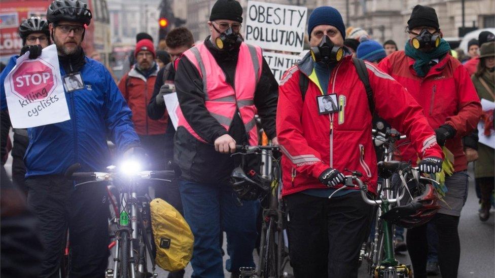 Cyclists stage 'die-in' protest in London for safer roads - BBC News