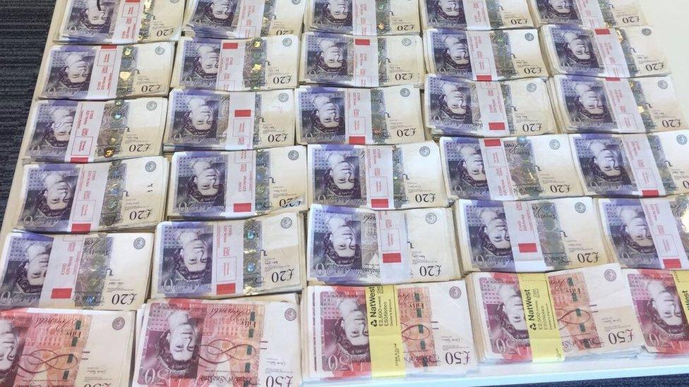Fake luxury goods worth £8m seized in Greater Manchester - BBC News