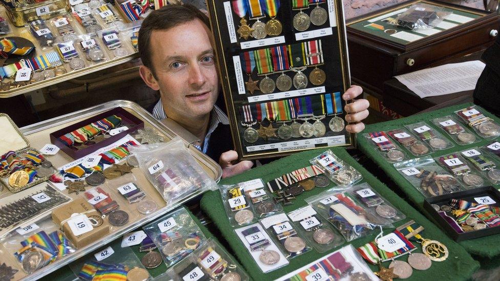 Huge medal collection sells for £13,000 at Dundee auction - BBC News