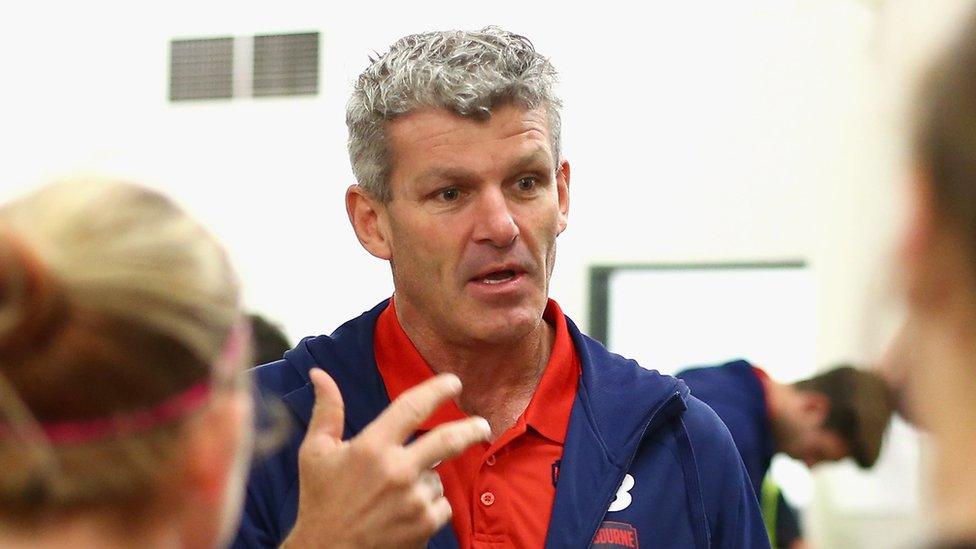 Australian footballer awarded 'landmark' disability payout - BBC News