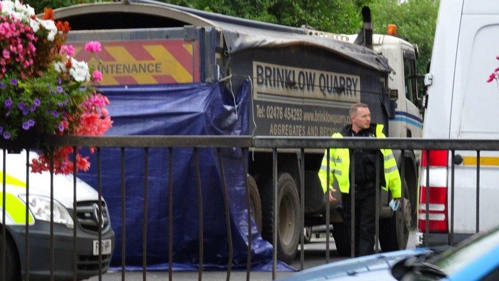 Woman trapped under lorry in Lincoln city centre - BBC News