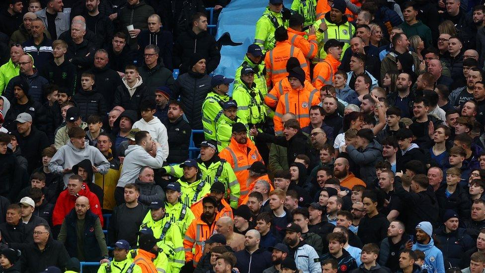 Man held after Munich tragedy chant at Manchester derby - BBC News