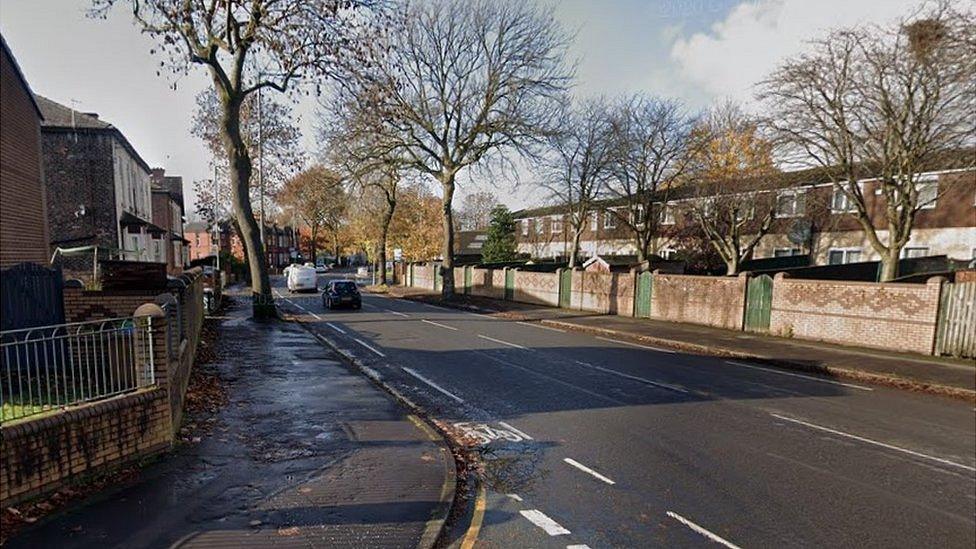 Longsight murder charge after man found dead at house - BBC News