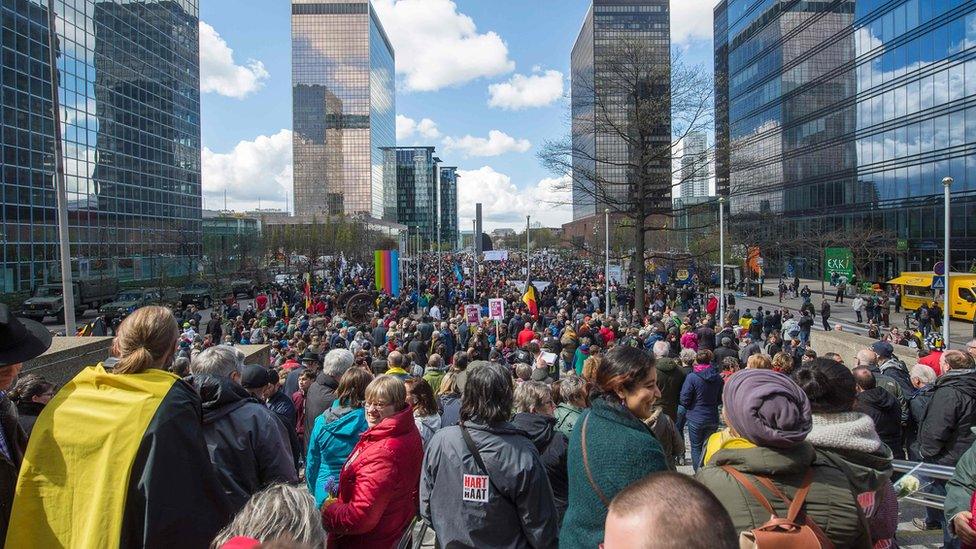 Brussels attacks: Thousands take to streets in anti-terror march - BBC News