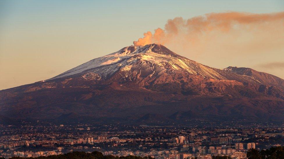 Mount Etna: Watch volcano blowing smoke rings in rare display - BBC ...
