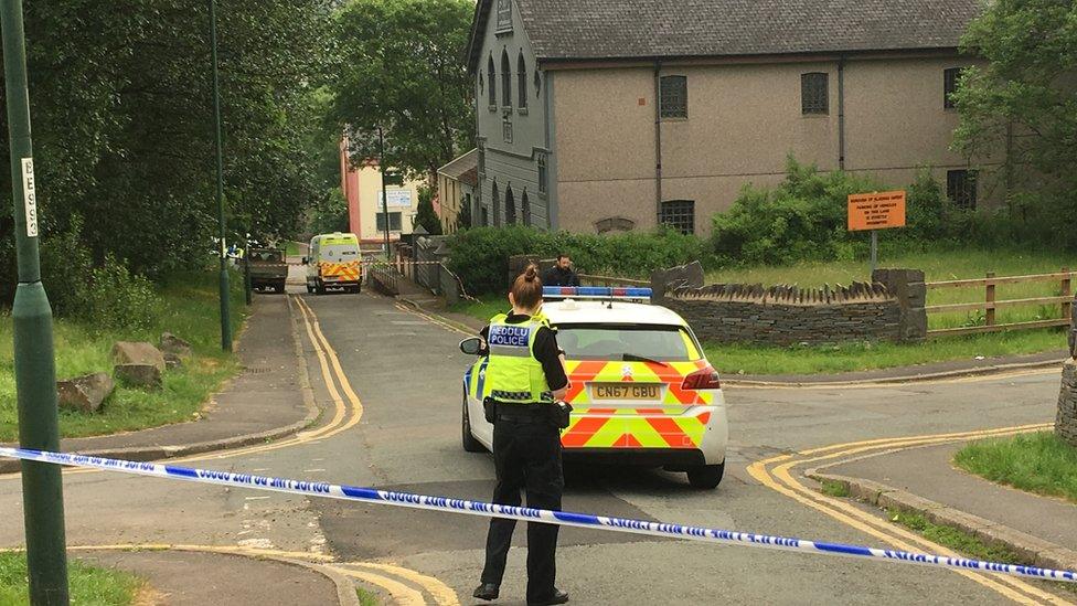 Tredegar 'machete' rooftop stand-off lasts 24 hours - BBC News