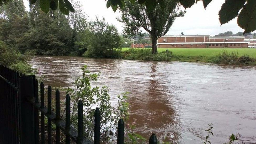Congleton village shop floods 'up to thighs' as rain disrupts travel ...