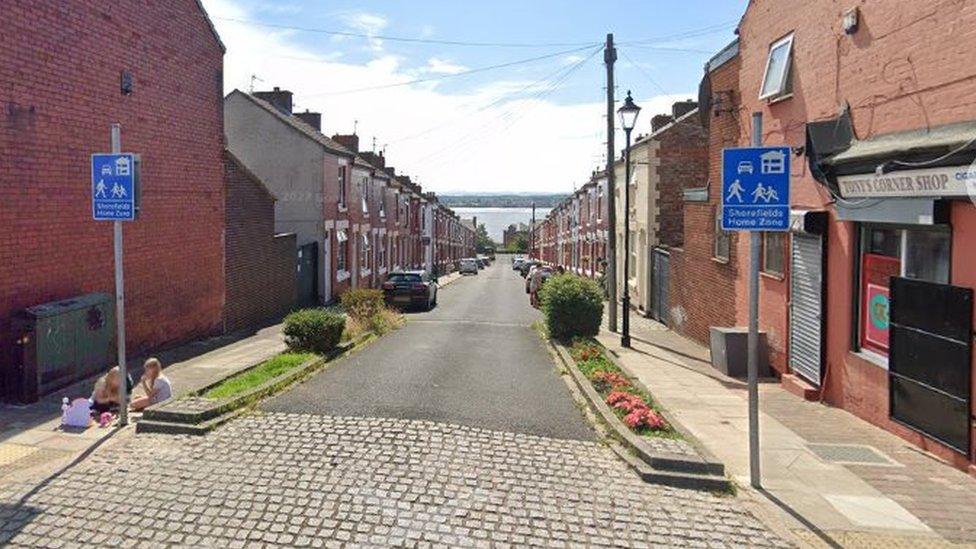 Man charged after hand grenade found at Liverpool home - BBC News