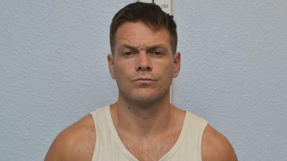 Far-right fitness guru jailed over terror manifestos - BBC News