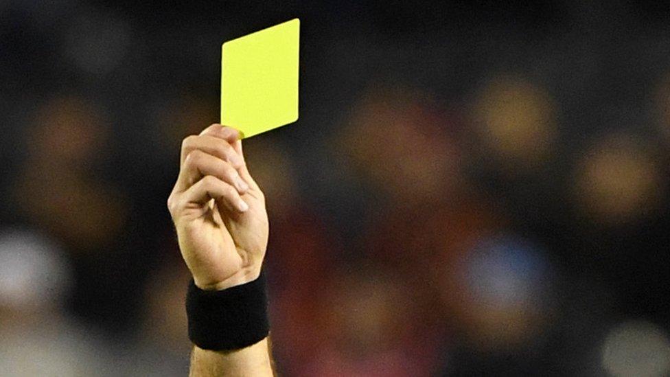 Pint thrown over football referee after match near Bristol - BBC News