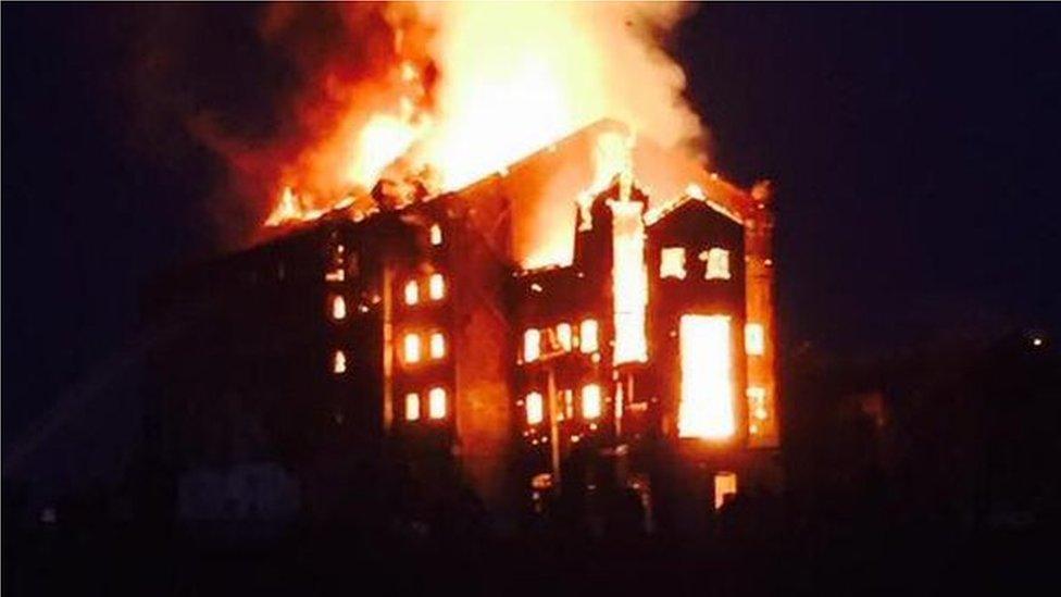 Gloucester warehouse blaze: Two held in arson probe - BBC News