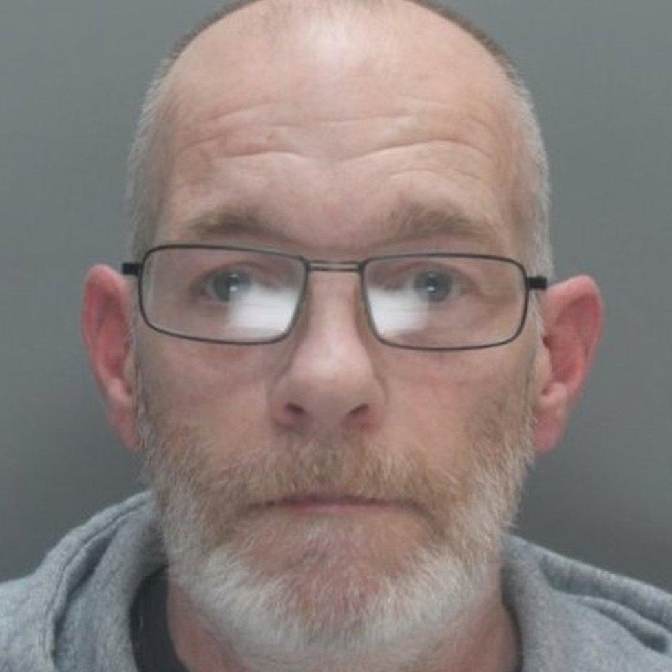 Armed robber in drag jailed for Liverpool sex shop raid - BBC News