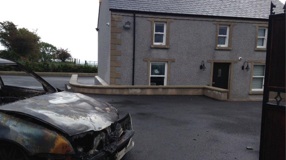 Larne attack: Man remanded over 'feud' shooting - BBC News