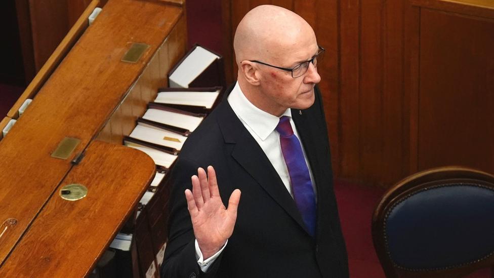 John Swinney sworn in as Scotland's first minister - BBC News