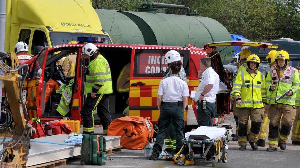 'Trapped by cheese' worker freed after warehouse collapse - BBC News