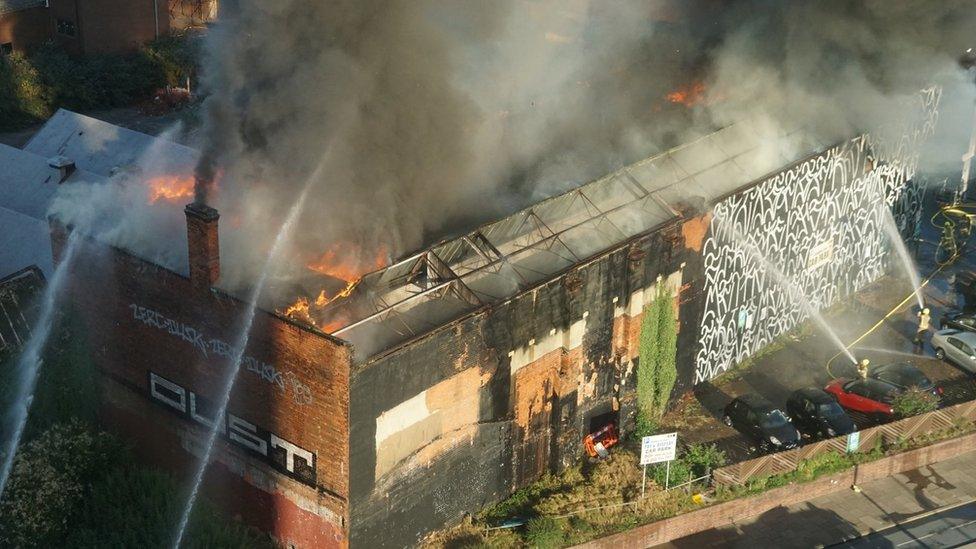 Huge fire rips through scrapyard near Clun - BBC News