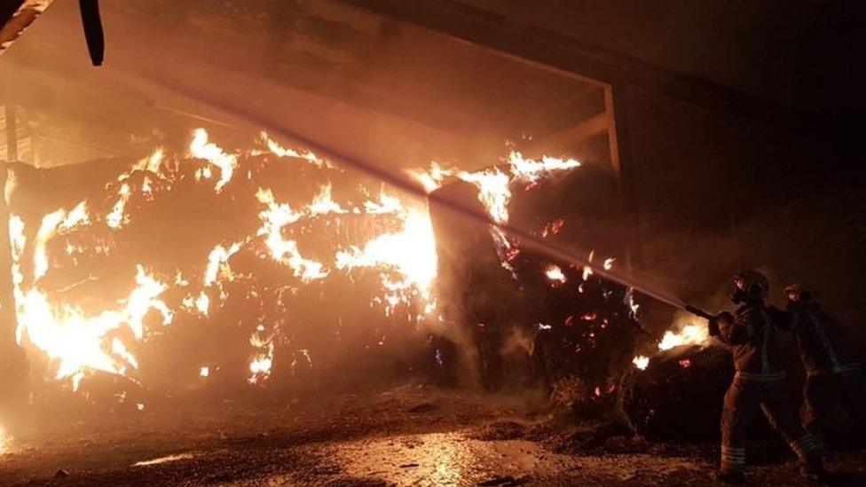 Arson probe after fire rips through barn in Marnhull - BBC News