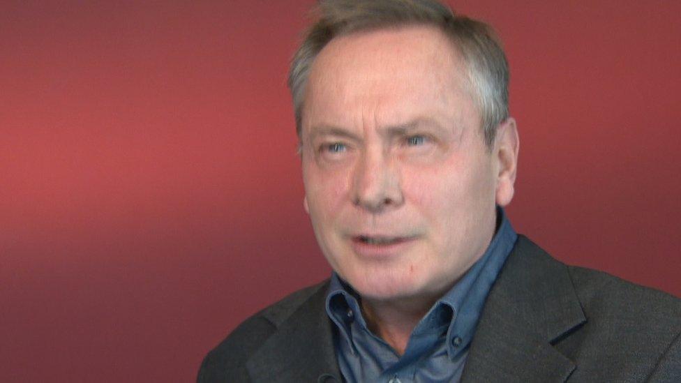 'I don't recognise my father' in new film Mad To Be Normal - BBC News