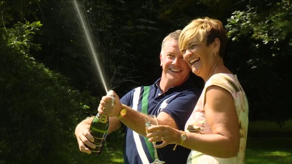 Lottery couple John and Alison Doherty put £14m win 'on hold' - BBC News