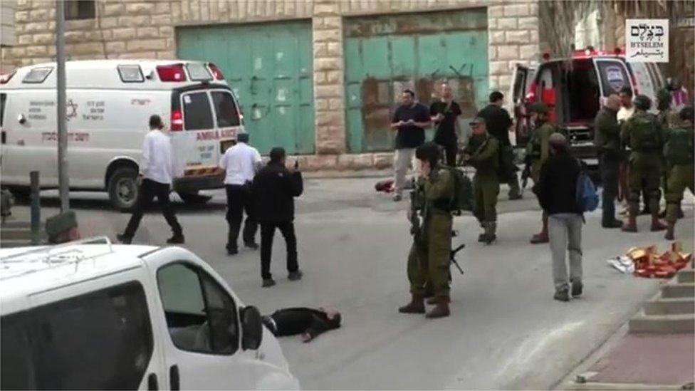 Israeli soldier 'faces manslaughter' for killing wounded attacker - BBC ...