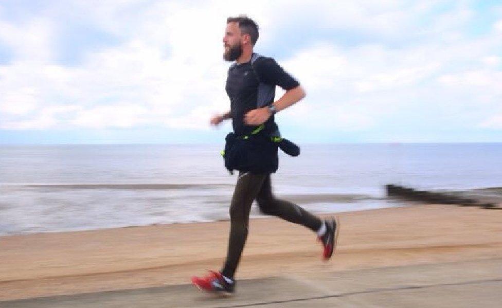 Wayne Russell completes 5,000-mile British coastline charity run - BBC News