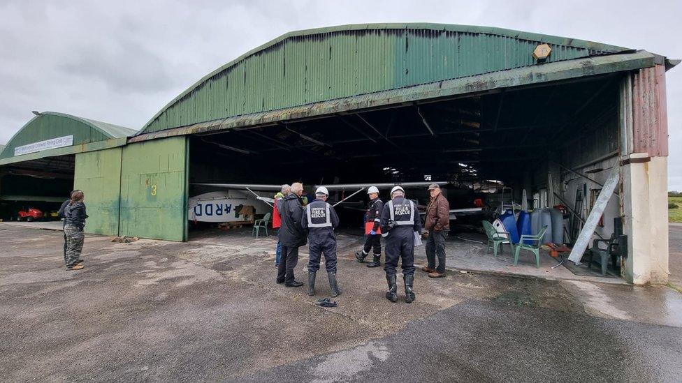 Bodmin pilot saves £1million of planes from hangar fire - BBC News