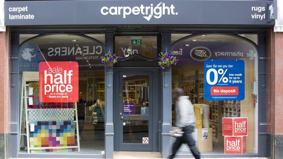 Carpetright shares plunge on new profit warning - BBC News