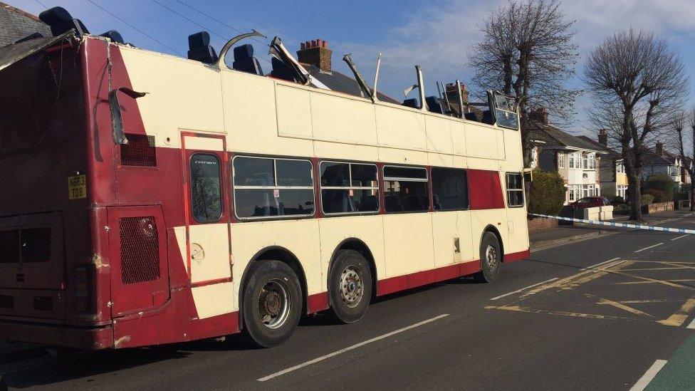 Bus roof ripped off in Bournemouth bridge crash - BBC News