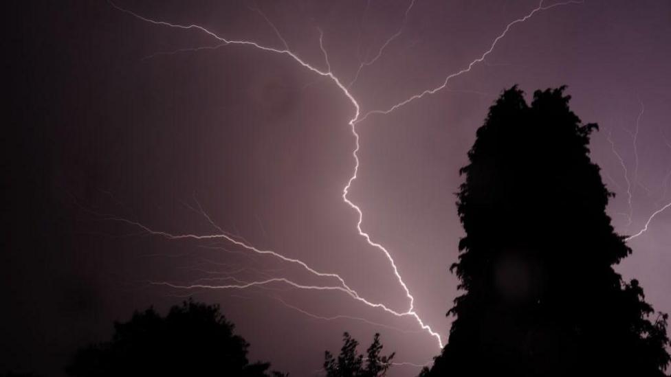 Dramatic lightning strikes captured over south's skies - BBC News