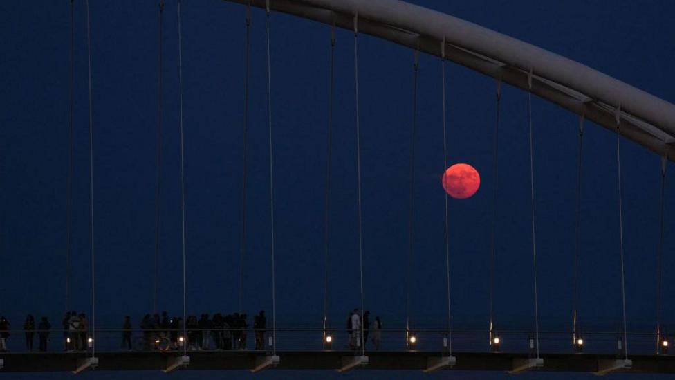 Strawberry Moon: Full Moon rises at famous sites over the world - BBC ...
