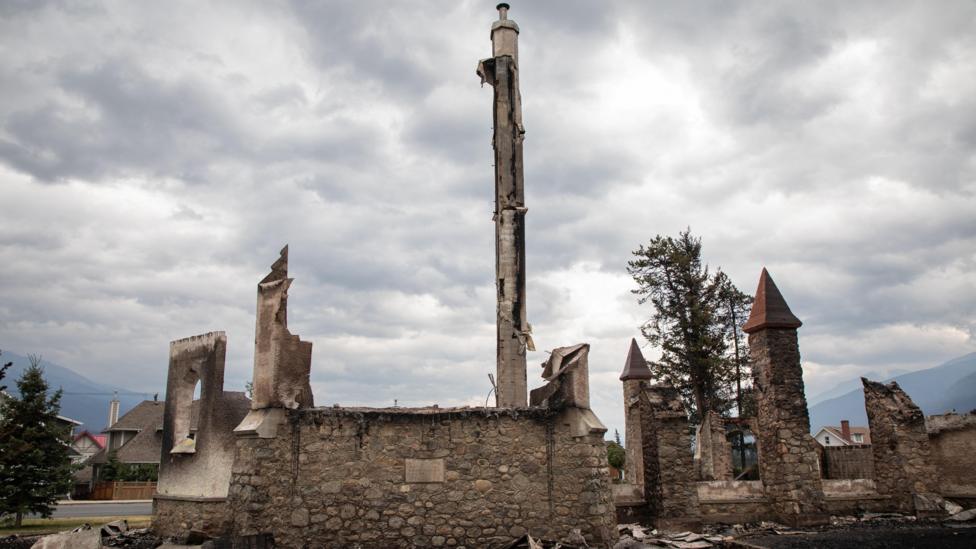 Jasper fire: Images show destruction from wildfire in Canada - BBC News