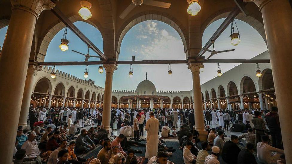 In pictures: Eid celebrations around the world - BBC News