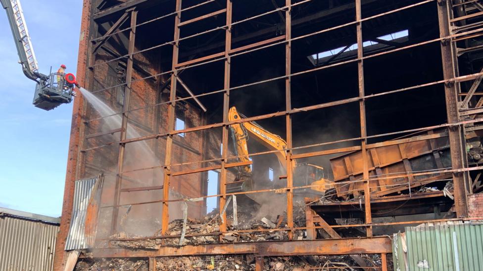 Safety plea to 'untouched' fire-damaged Supa Skips waste site - BBC News