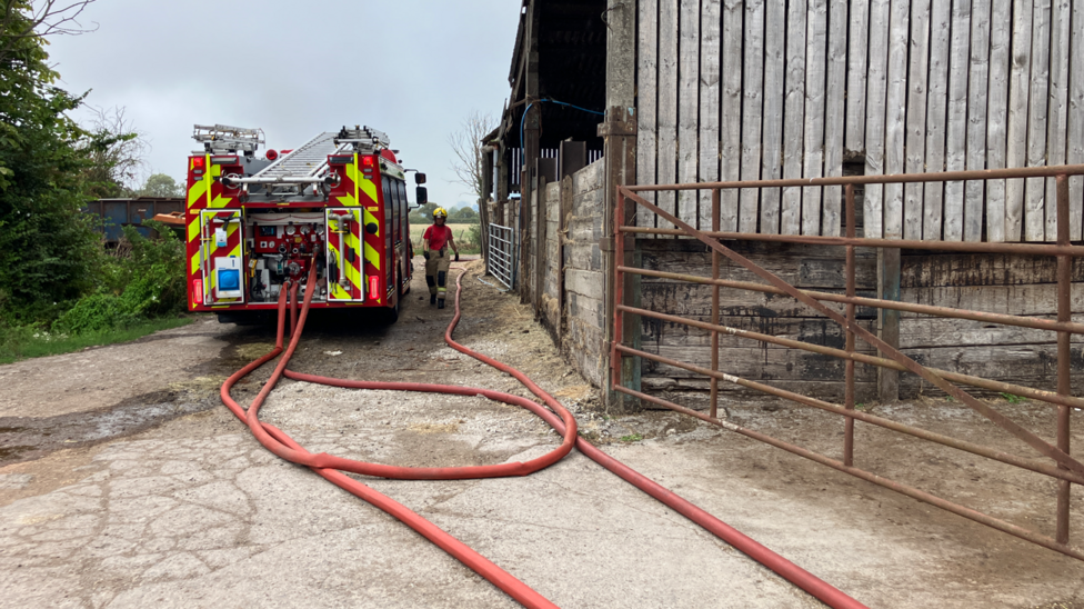 Claverham residents return to houses after barn fire controlled - BBC News