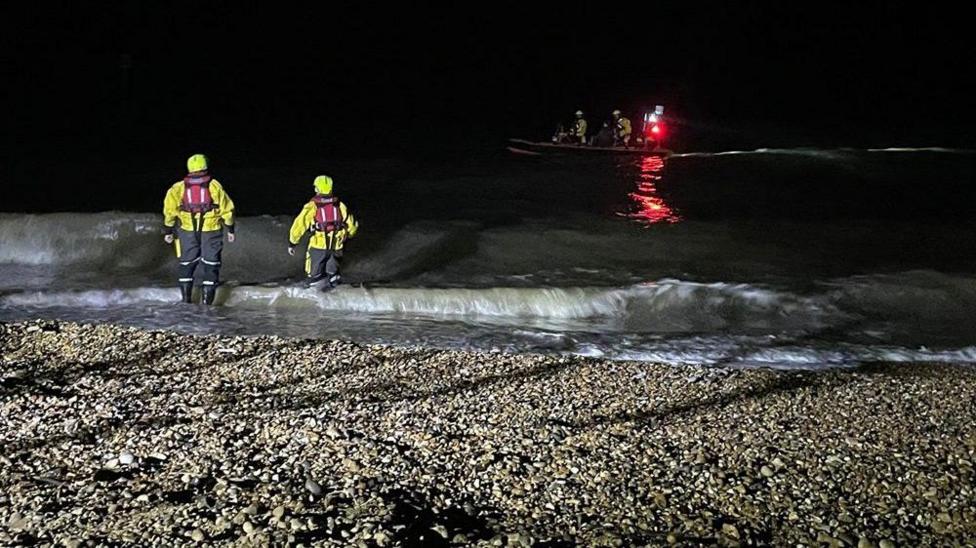Two men trapped under Fairlight Cliffs rescued - BBC News