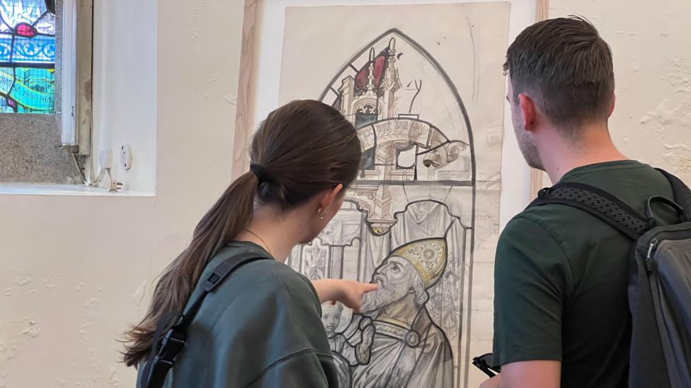 Restored cartoons from famous Jersey artist go on display - BBC News