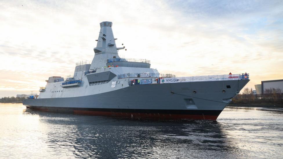 Bow section of latest Type 26 frigate sails up the Clyde - BBC News