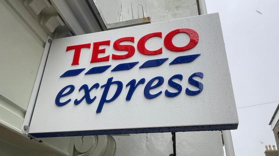 First Tesco Express store opens on island after Shoprite takeover - BBC ...