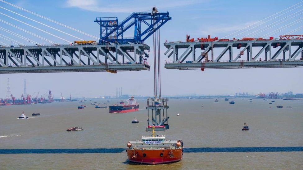 World's longest cable-stayed bridge is fully connected - BBC Newsround