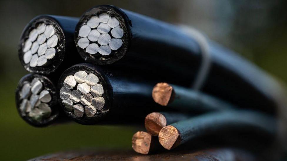 Thieves steal cable from under the road near Bromsgrove - BBC News