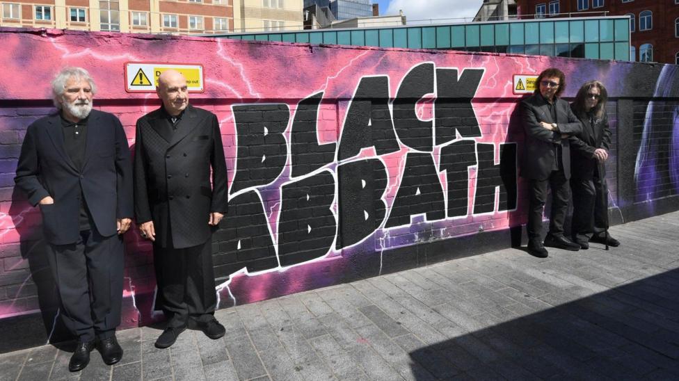 Surprise gift for artist as Ozzy and Black Sabbath visit Birmingham ...