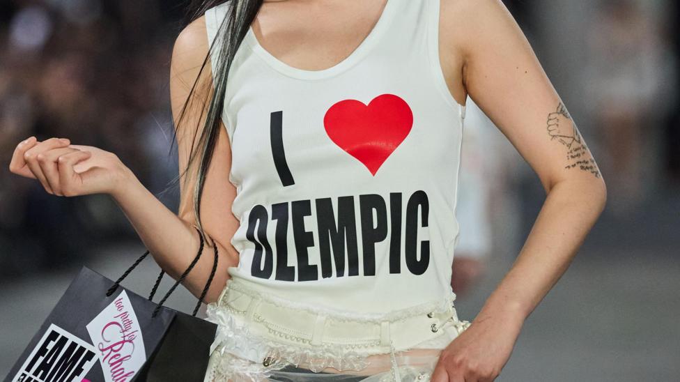 Next ad banned as pose made model look too thin - BBC News